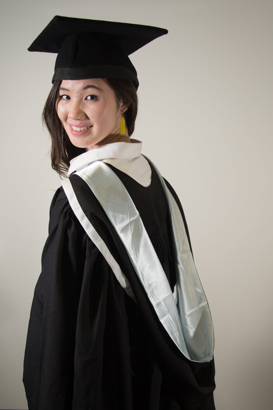 RMIT bachelor of social work graduation gown set - Side view