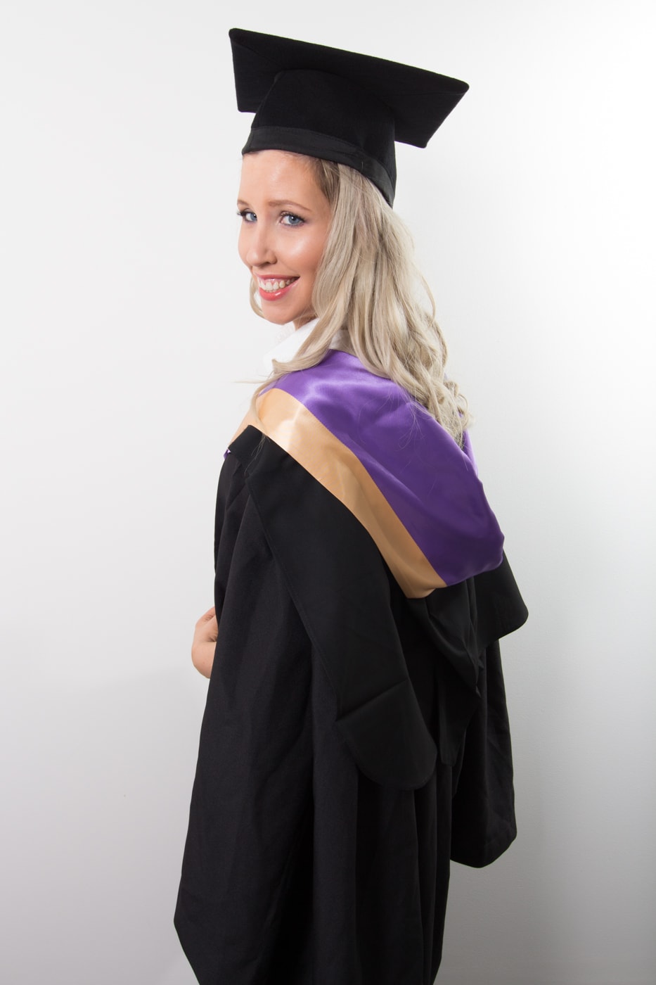 UNE Bachelor of Education graduation gown set - Side view