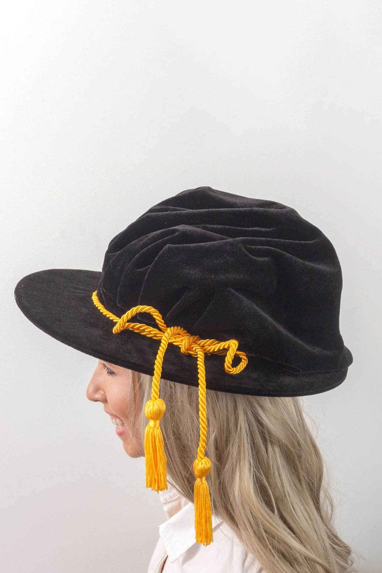 PhD hat with yellow tassel