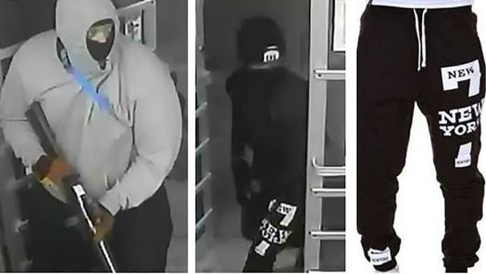 Two men point guns at convenience store cashier, get away with money
