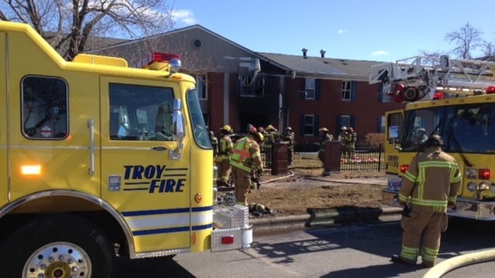 Troy firefighters rescue 3 residents from apartment fire