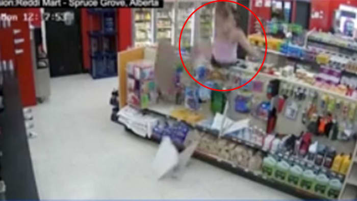 VIDEO: Woman falls through ceiling trying to escape from police