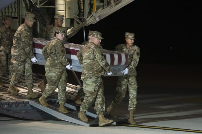 Hundreds attend funeral for Navy sailor slain in base attack