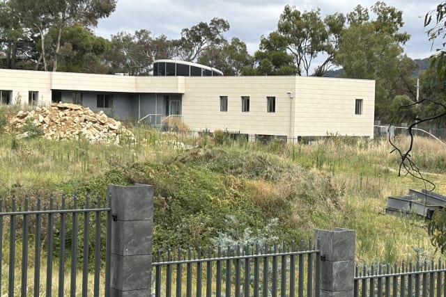 A suspected Russian diplomat is occupying a proposed embassy site ...