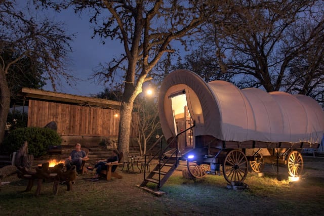 Glamp it up Texas-style in this covered wagon listed on Airbnb