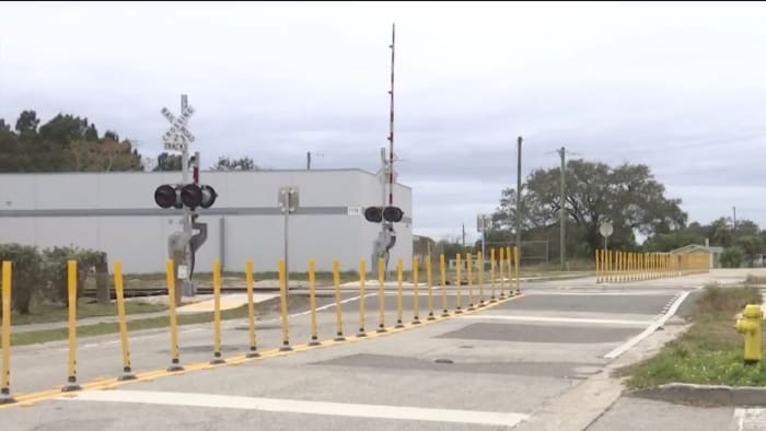 New safety poles installed at Melbourne railway crossing after fatal ...
