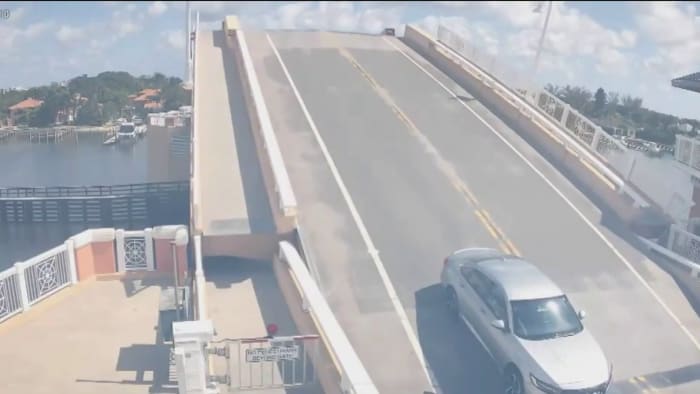 Video shows close call as Florida drawbridge raises with car on it