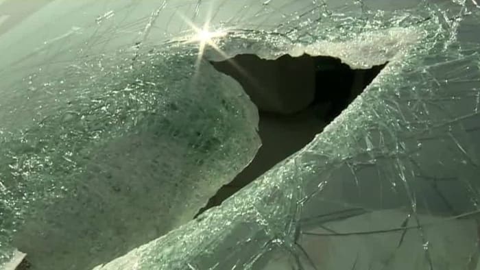Driver Knocked Unconscious By Piece Of Concrete Flying Through