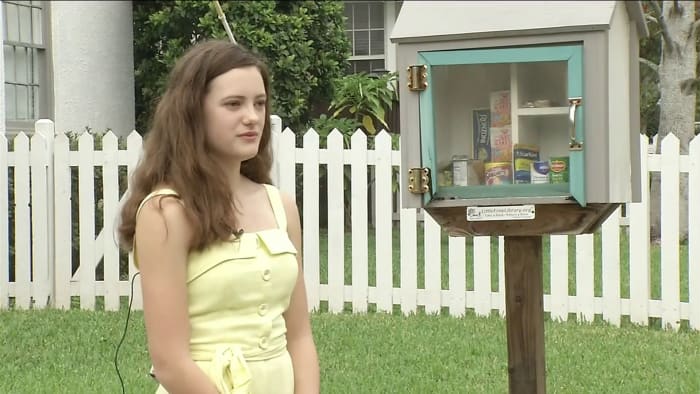 Neighborhood’s ‘Little Free Library’ converts to mini food bank