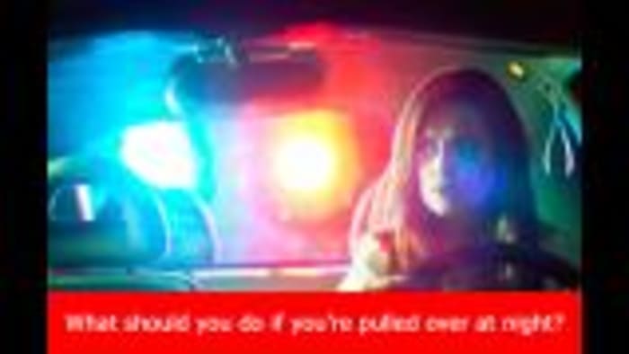 What should you do if you get pulled over at night?