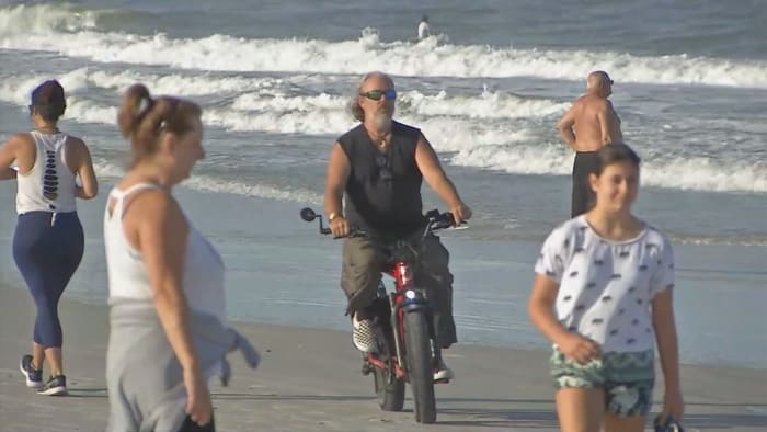 Visitors cheer as Jacksonville beaches reopen