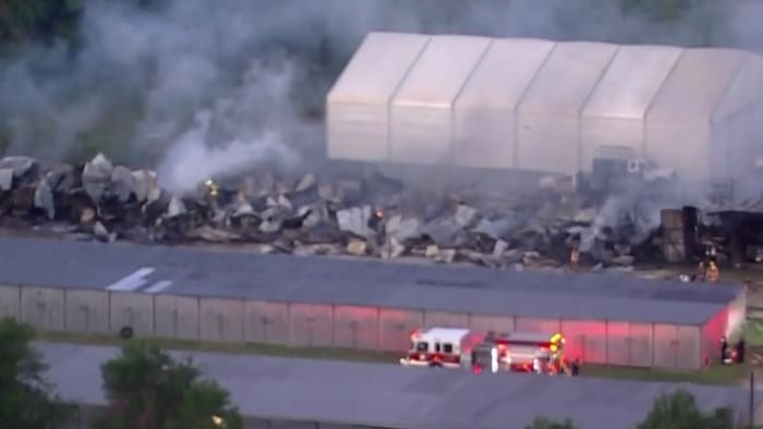 Lit candle sparks massive warehouse fire in NW Harris County, destroys ...