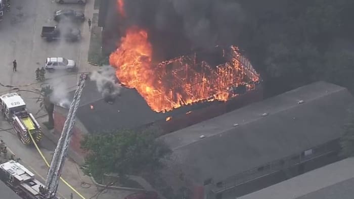 Arson team investigating large structure fire on Southeast Side