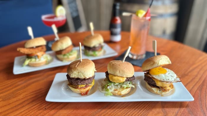 They have so many burgers to choose from at this slider bar