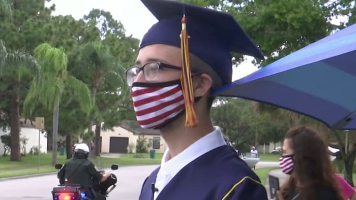 Navy recruit missing high school graduation gets surprise parade sendoff