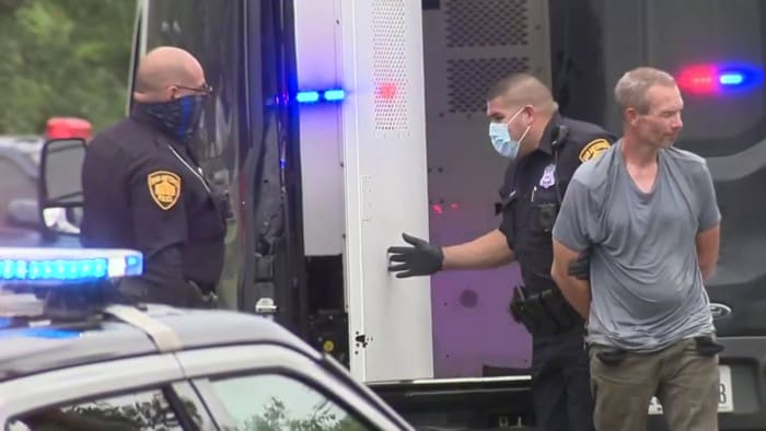 SAPD officer punched in face while writing traffic ticket; man arrested