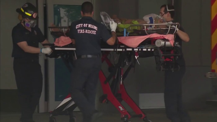 Construction workers injured after bundle of rebar falls on them in ...