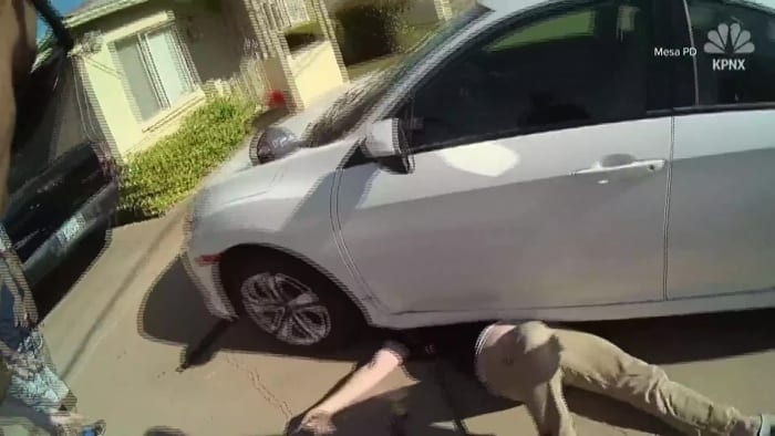 WATCH: Dramatic video shows moment cops lift car off man pinned underneath