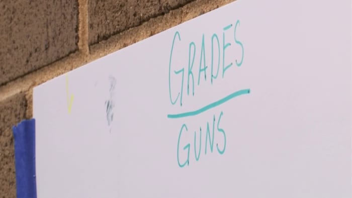Grades Over Guns hands out school supplies and teaches gun violence ...