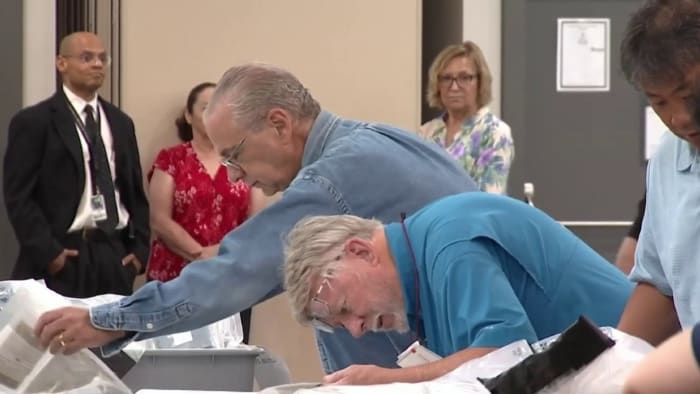 Collectors and the curious converge at unclaimed property auction in Orlando