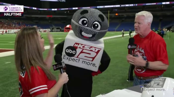 Mic the new KSAT mascot hangs out at the 2023 KSAT Pigskin Classic