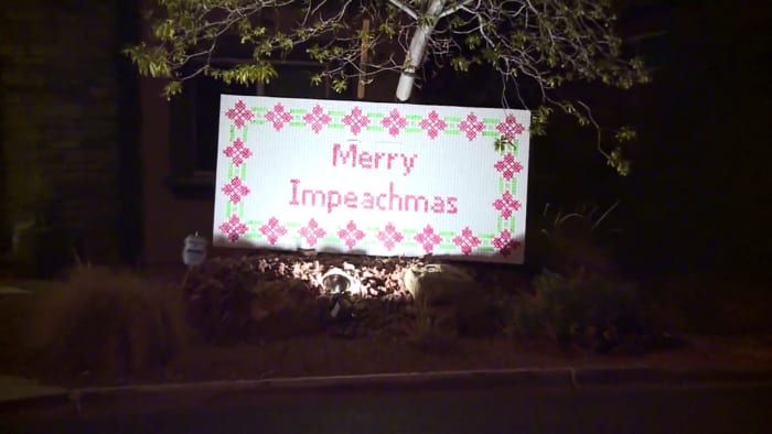 ‘Merry Impeachmas’ sign sparks controversy