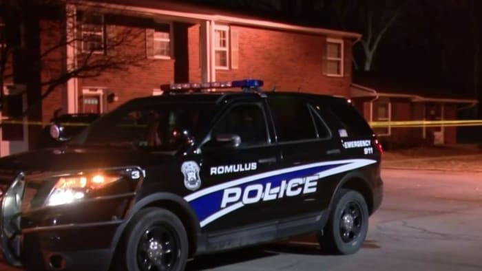Police tape off Romulus apartment complex