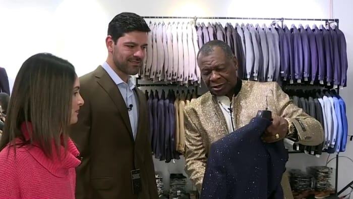 Shopping with Calvin Murphy to see where he gets his famous flashy suits