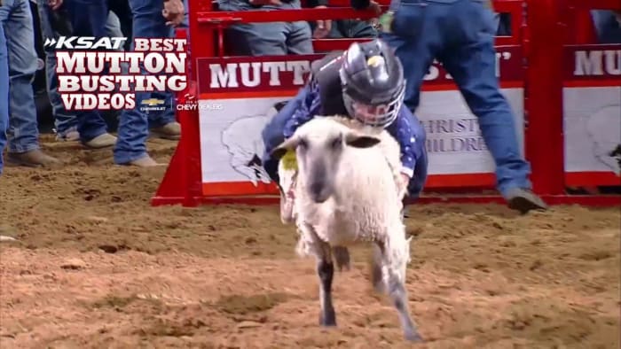Young cowboy goes the distance in Mutton Busting