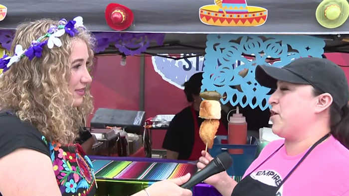 KSAT's Avery Everett speaks with booth owners, public ahead of Battle of Flowers parade