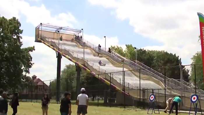 Controversial Belle Isle slide reopens with improvements to keep riders ...