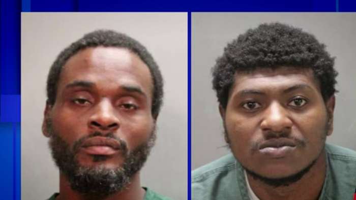 2 men charged in connection with murder of man found inside burnt vehicle