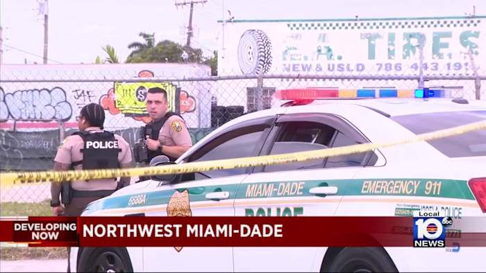 Police officers surround area in northwest Miami-Dade