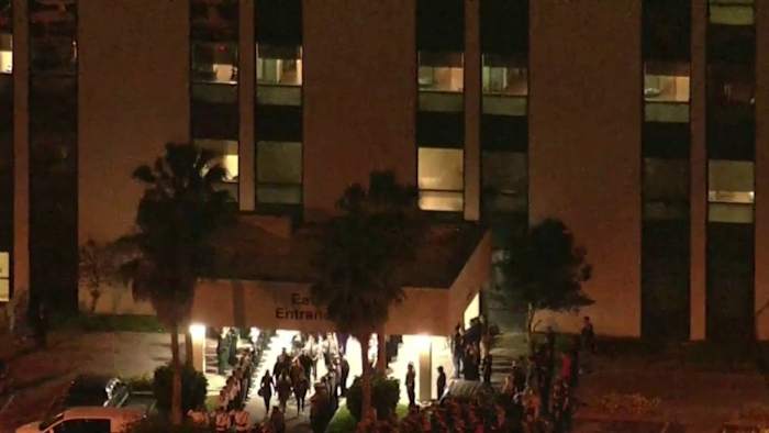 Community honors Officer Jason Raynor, suspect has charges upgraded