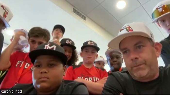 News 6's Justin Warmoth talks to Lake Mary Little League team