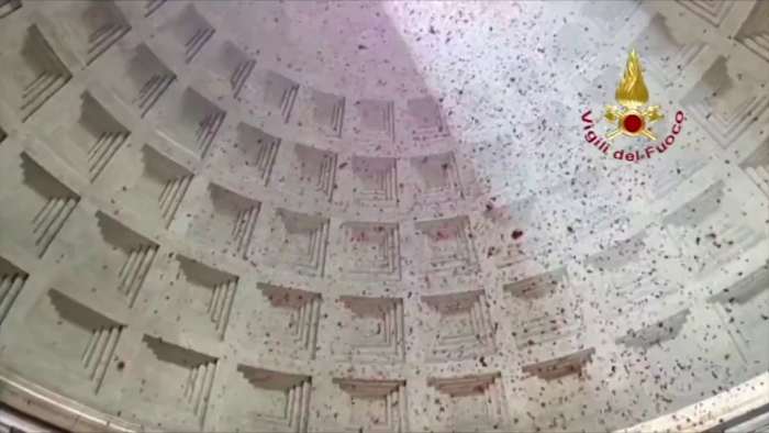 Rose petals rain down from oculus of Rome's Pantheon in Pentecost ceremony