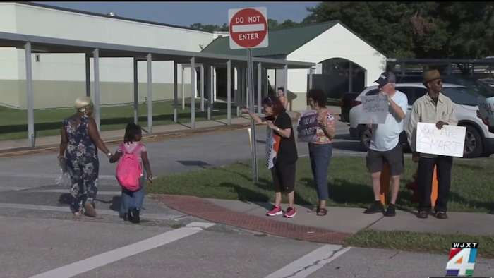 Faith, local leaders encourage Bunnell Elementary students arriving to ...