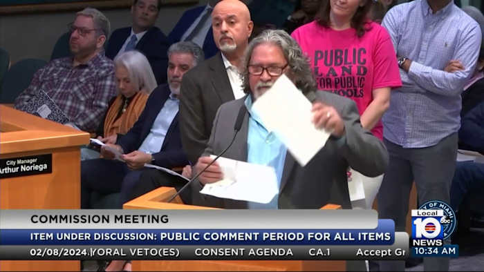 Commissioner Joe Carollo suddenly served with summons during meeting