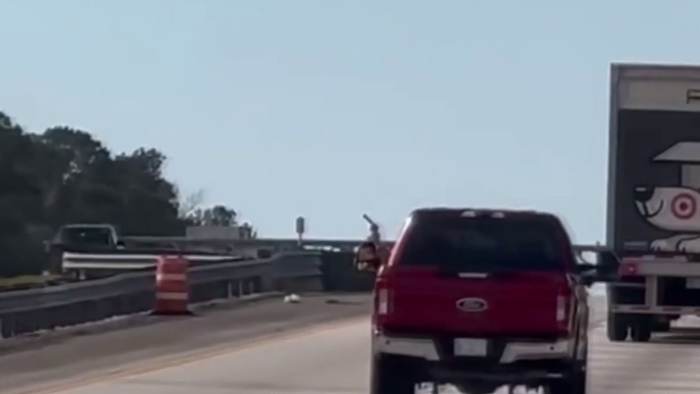 VIDEO: Driver waves gun at vehicles, fires shots on I-95 in Florida