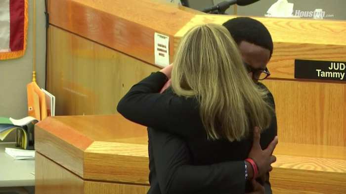 Botham Jeans brother hugs former police officer who killed him