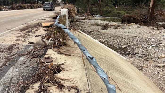TxDOT shows twisted piece of guardrail damaged by Hill Country flooding