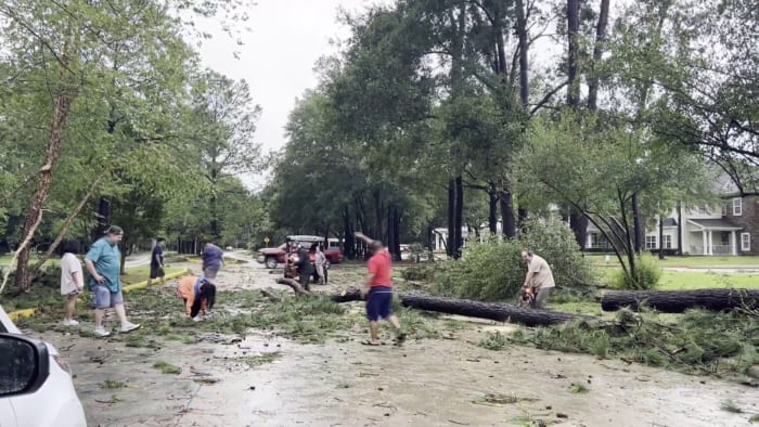 Good Samaritans cut through downed trees in NW Harris Co. after ...