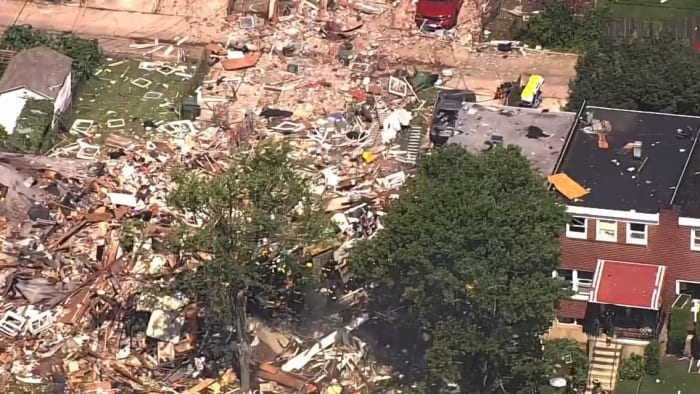 One dead, 4 rescued after gas explosion levels Baltimore homes