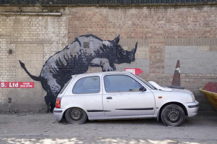 Banksy unveils new rhino art in an animal-themed collection that has ...