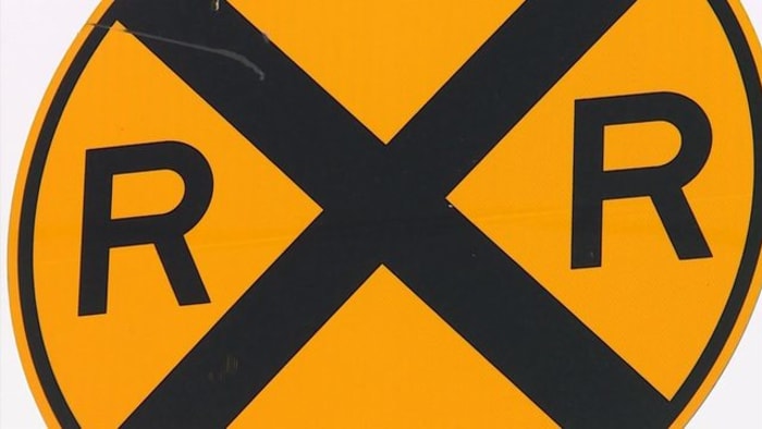 Stalled train blocking traffic on 10 Mile Road in Novi