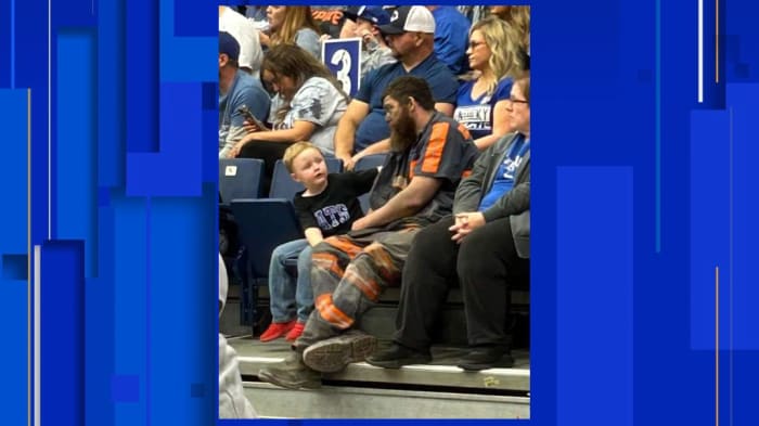 Father of the year: Photo of soot-covered coal miner sitting with son ...