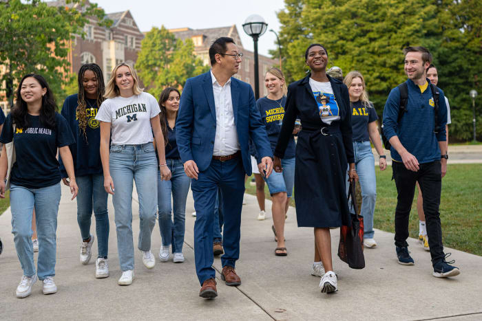 Santa Ono greets students on campus in Ann Arbor as he starts ...