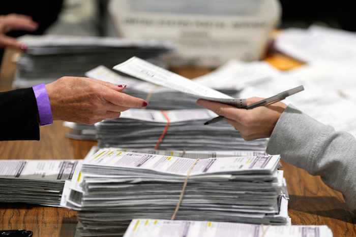 Justice Department's early moves on voting and elections signal a shift ...