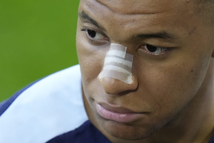 Kylian Mbappé trains at Euro 2024 with bandage on broken nose and ...