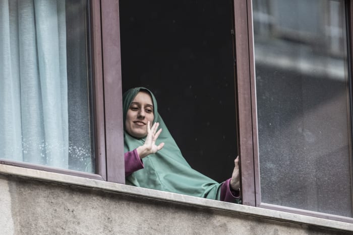 Bigotry mars return of Italy hostage who converted to Islam